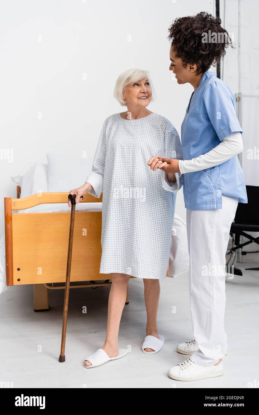 African woman walking cane hi-res stock photography and images - Alamy