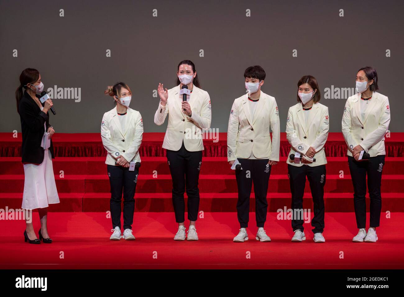 Hong Kong medalist athletes give a speech during the ceremony in ...