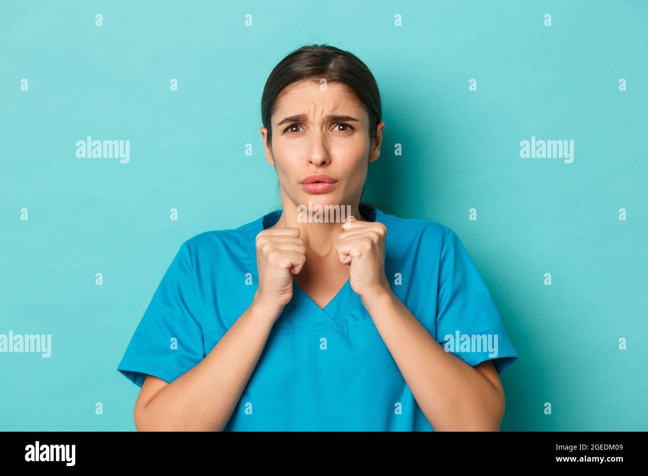 Nurse in scrubs looking worried hi-res stock photography and images - Alamy