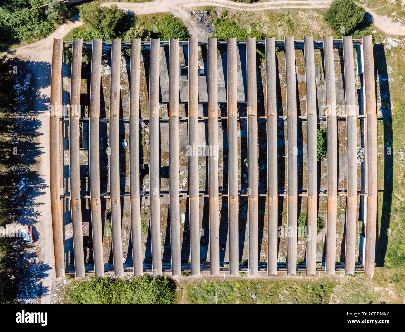 Aerial view of an abandoned building in disuse near the industrial area ...