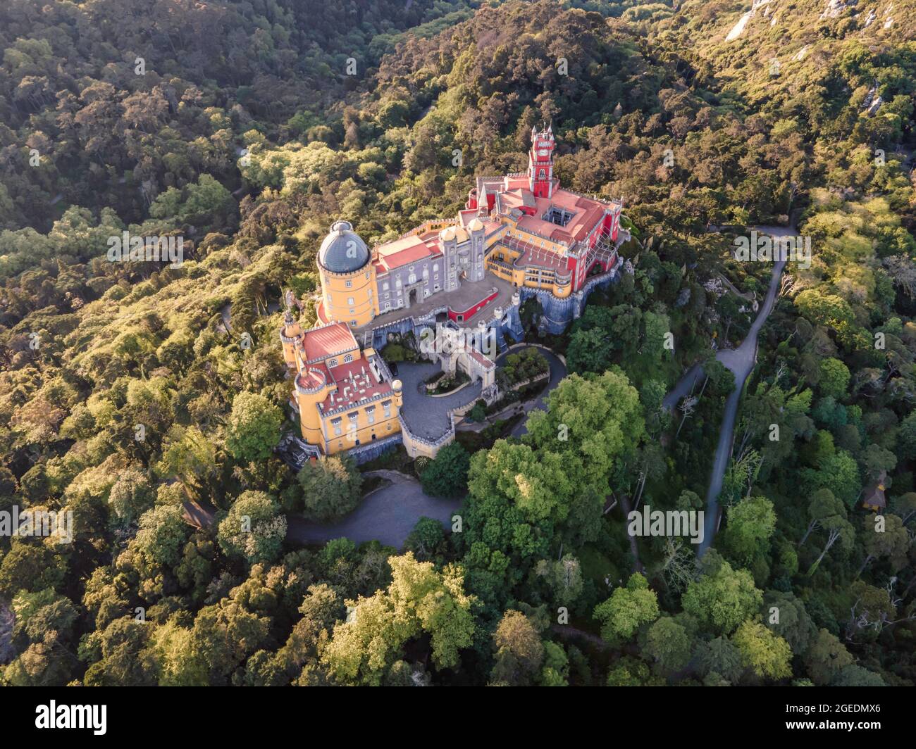 Aerial view of Pena Palace, a colorful Romanticist castle at sunset ...