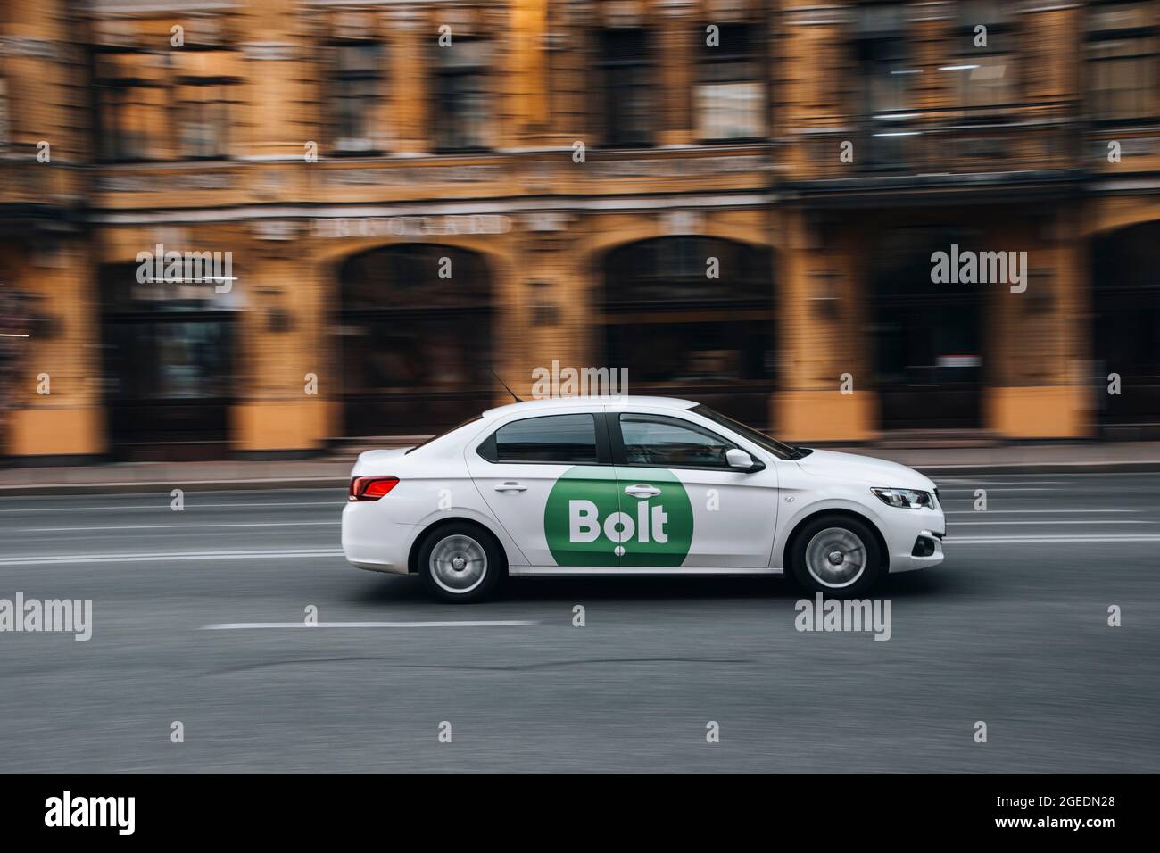 Ukraine, Kyiv - 2 June 2021: White Lifan Murman Taxi Bolt car moving on ...