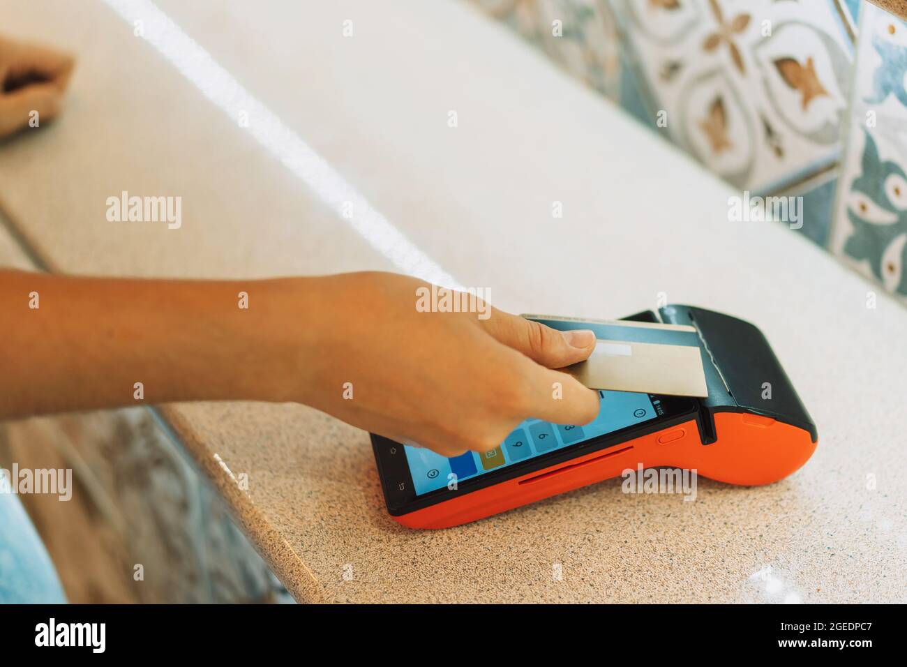 Contactless payment from card via pos terminal Stock Photo - Alamy