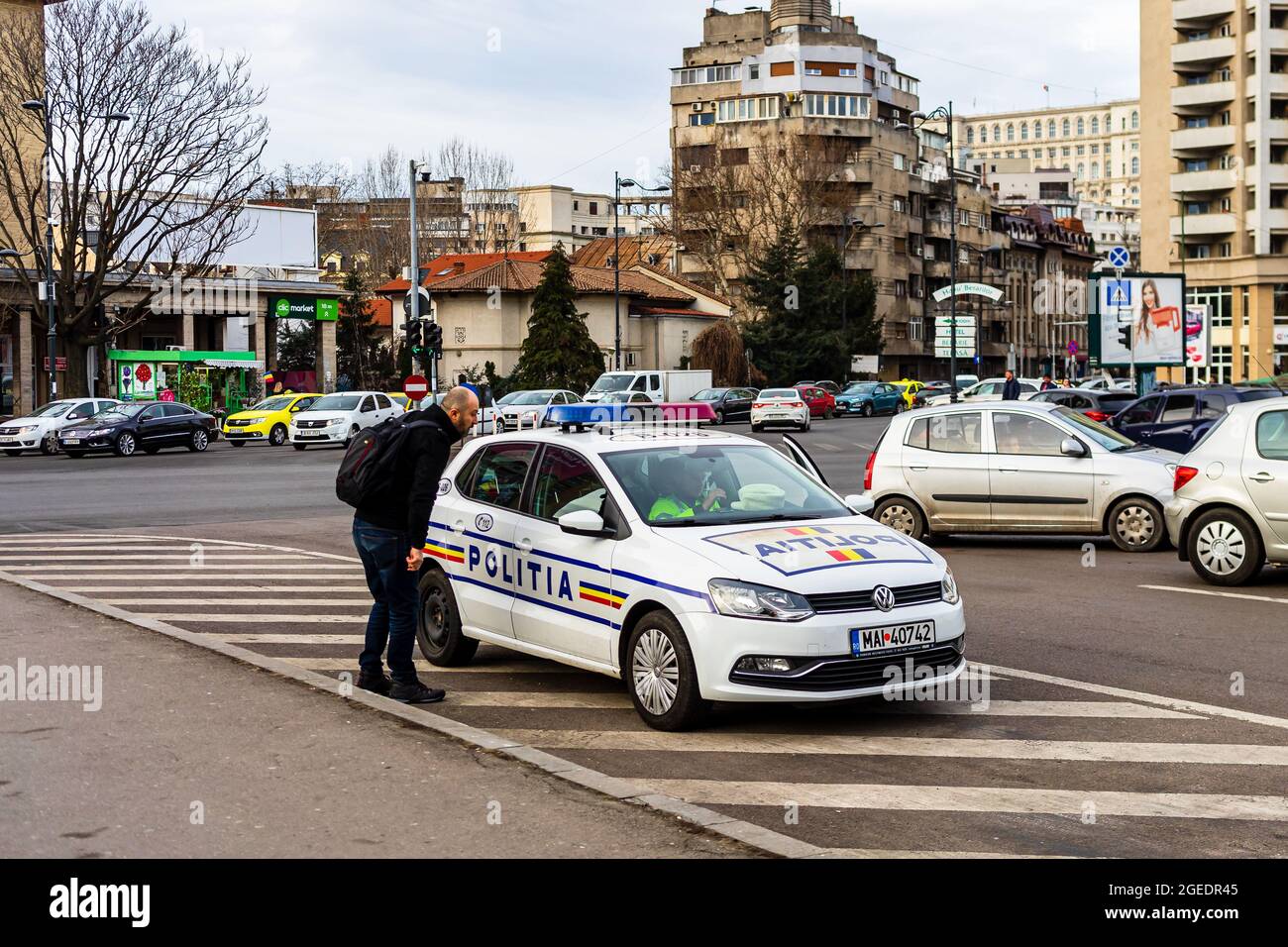 Romanian police (Politia Rutiera) car patrolling in downtown Bucharest ...