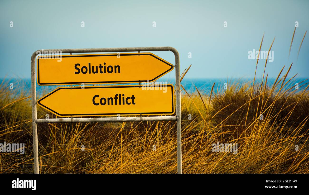 Street Sign the Direction Way to Solution versus Conflict Stock Photo ...