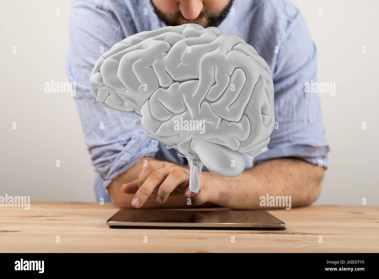 Person working with a 3D render of human brain - artificial ...