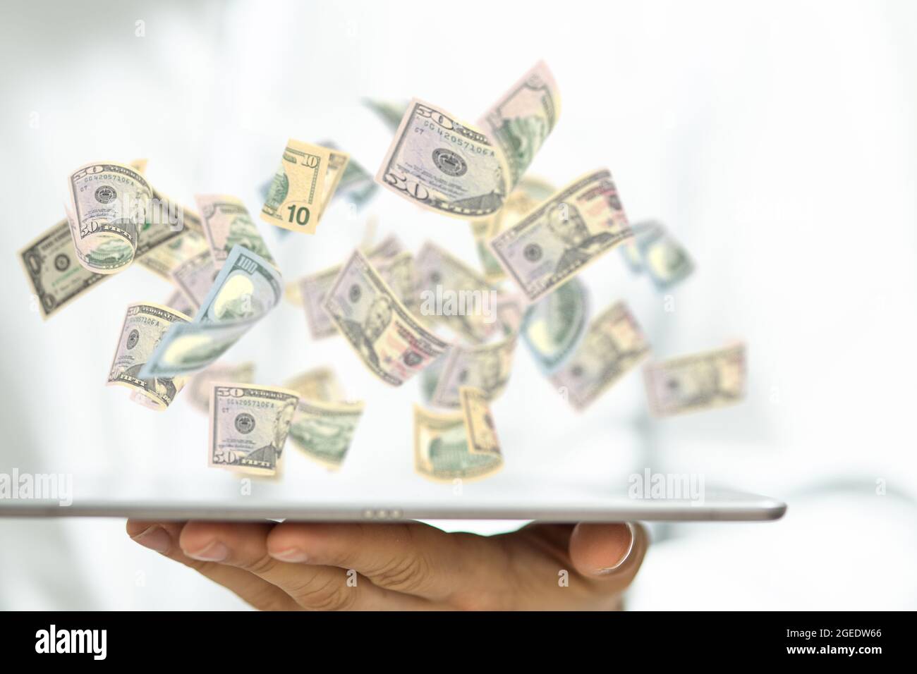 Businessman's hands holding floating dollar banknotes-business and ...