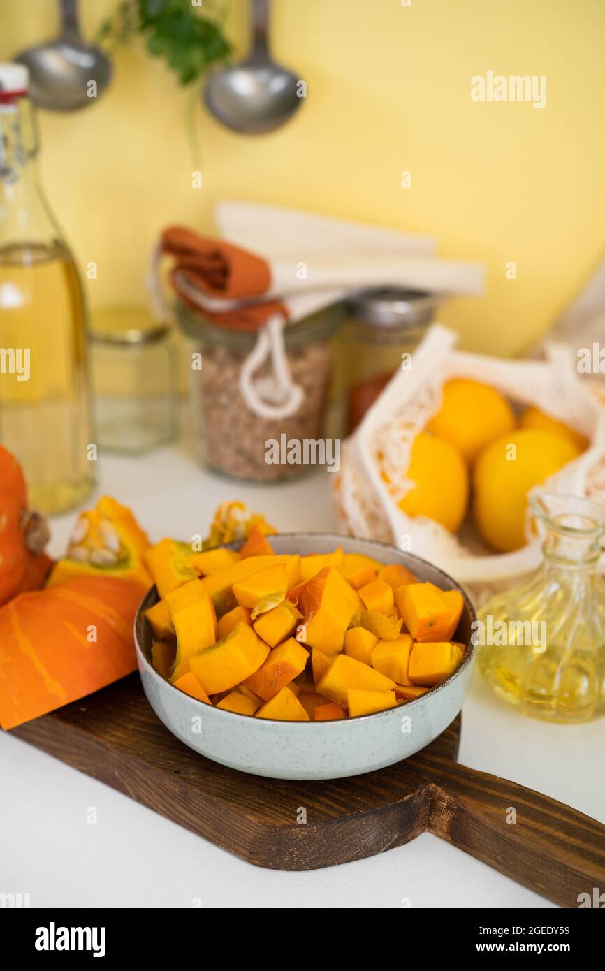 A plate with raw pumpkin pieces Stock Photo - Alamy