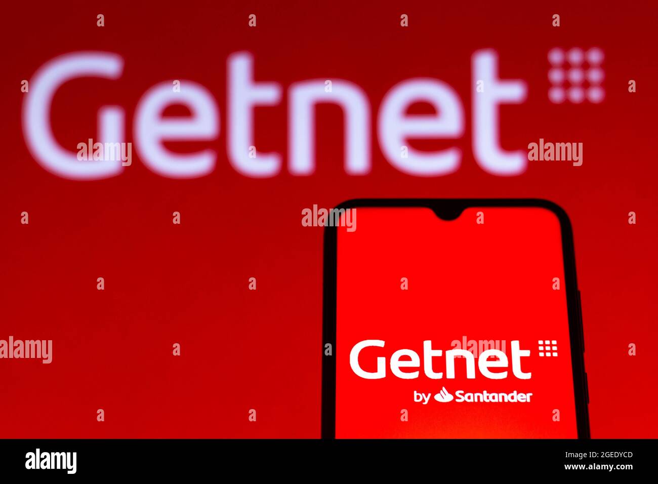 In this photo illustration the Getnet logo seen displayed on a ...
