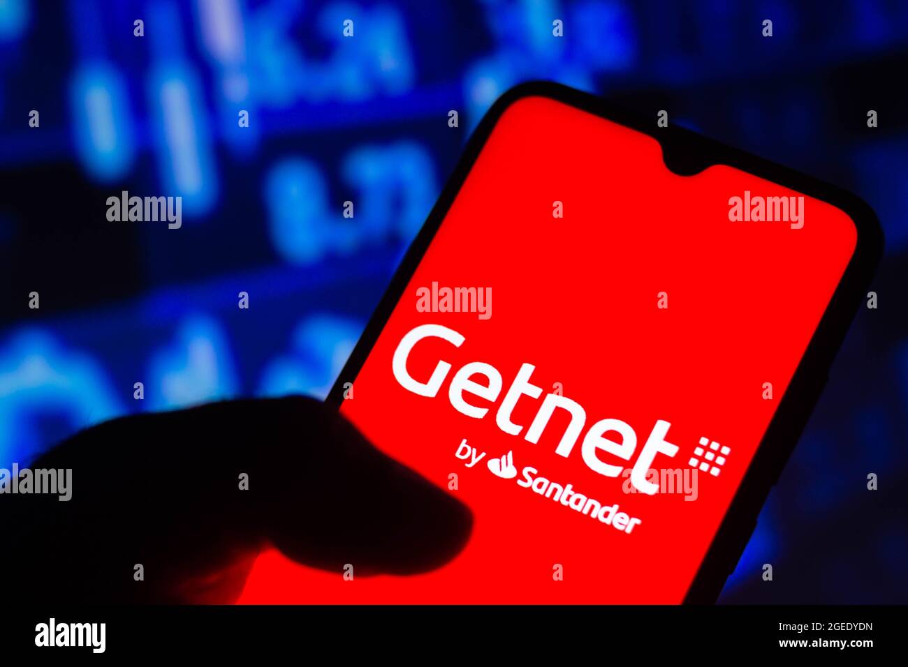 In this photo illustration the Getnet logo seen displayed on a smartphone Stock Photo - Alamy