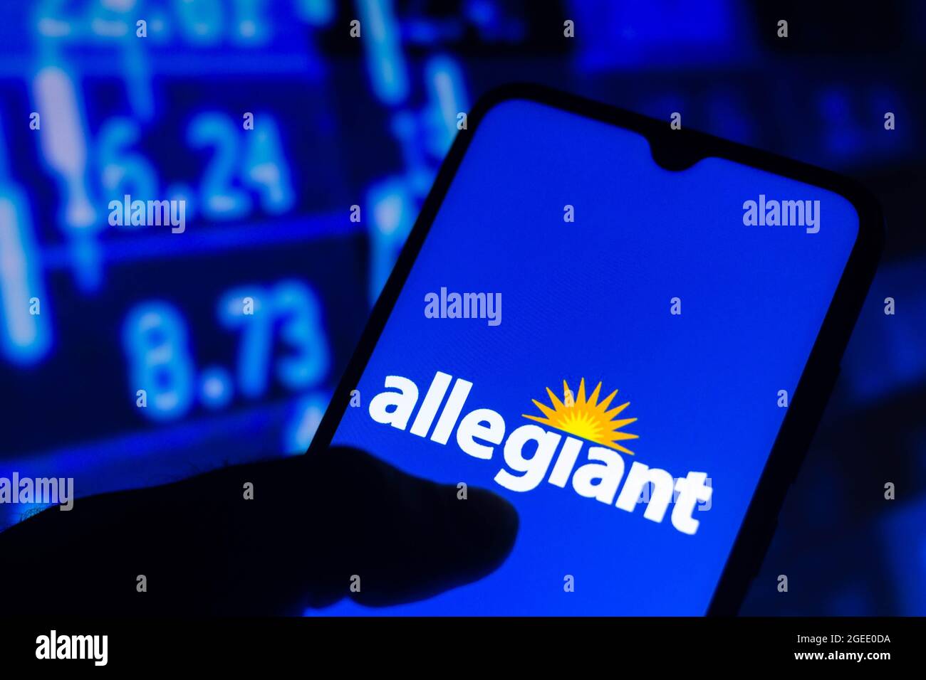 In this photo illustration the Allegiant Air logo seen displayed on a ...