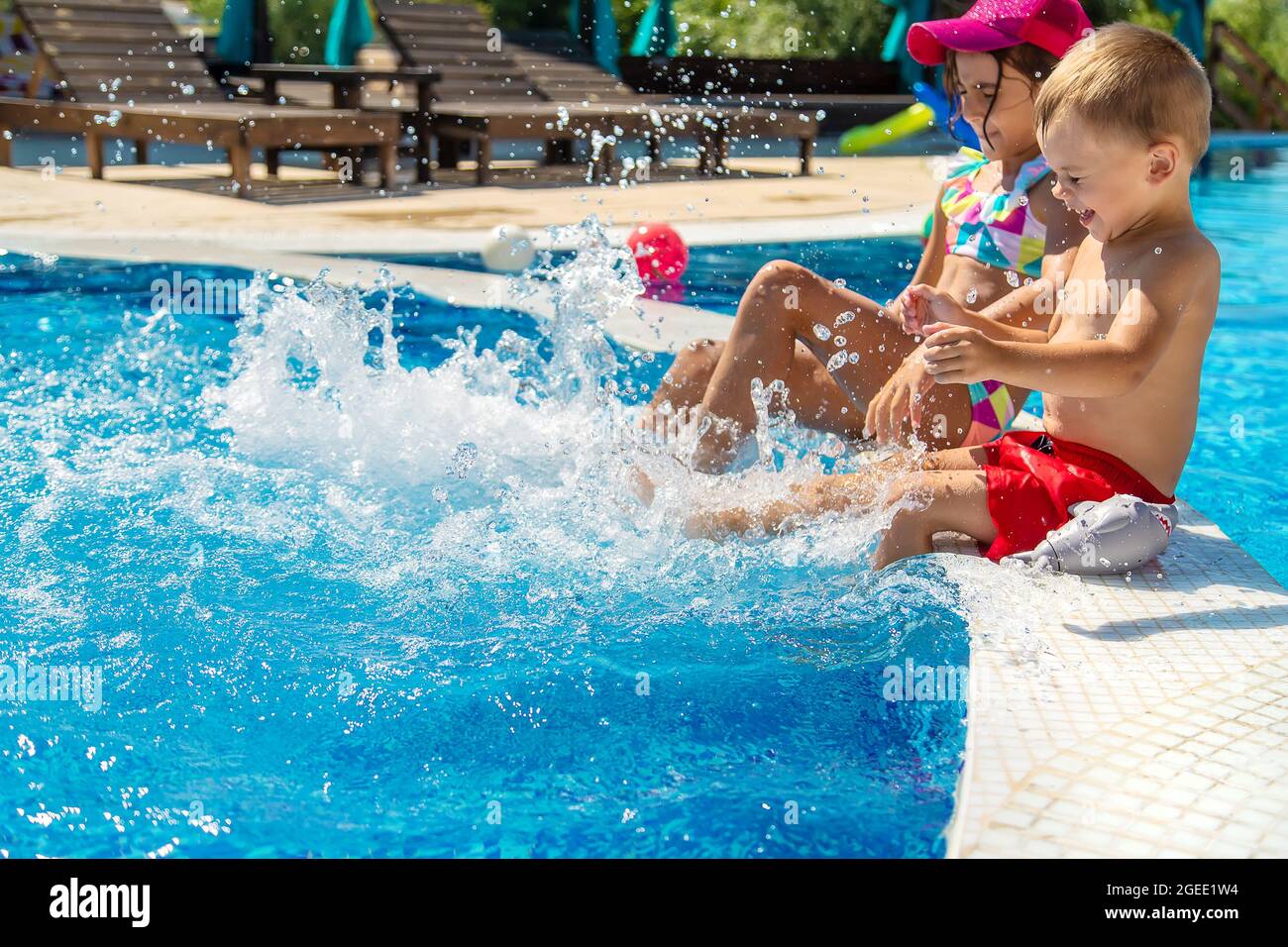 Kids holiday pool bikini hi-res stock photography and images - Alamy