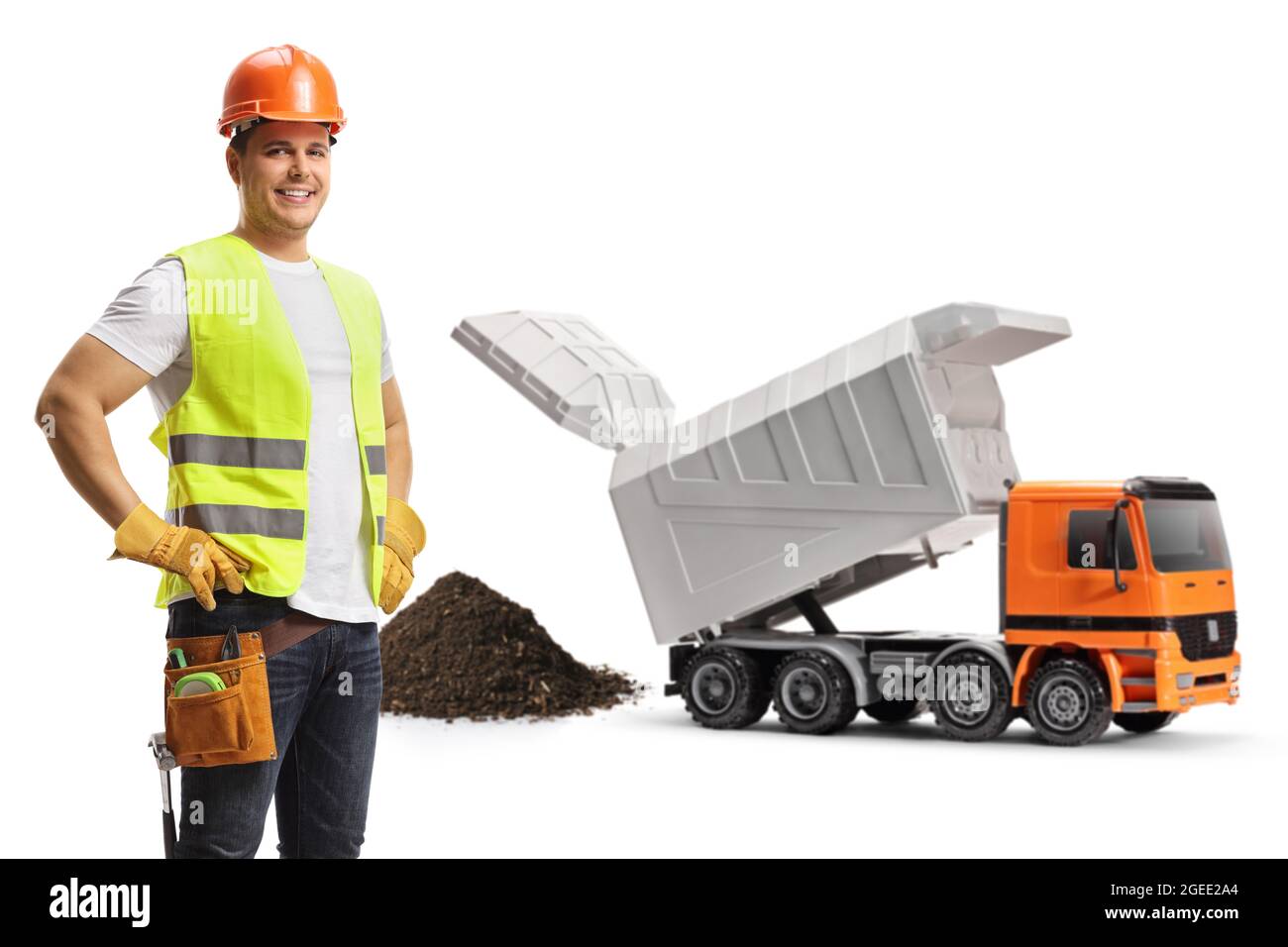 Construction worker with a helmet and tool belt standing in front of a ...