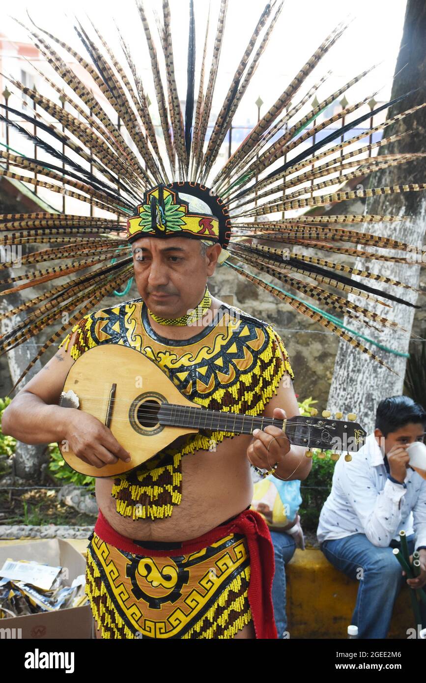 Traditional musicians, called concheros, getting ready to perform in an ...