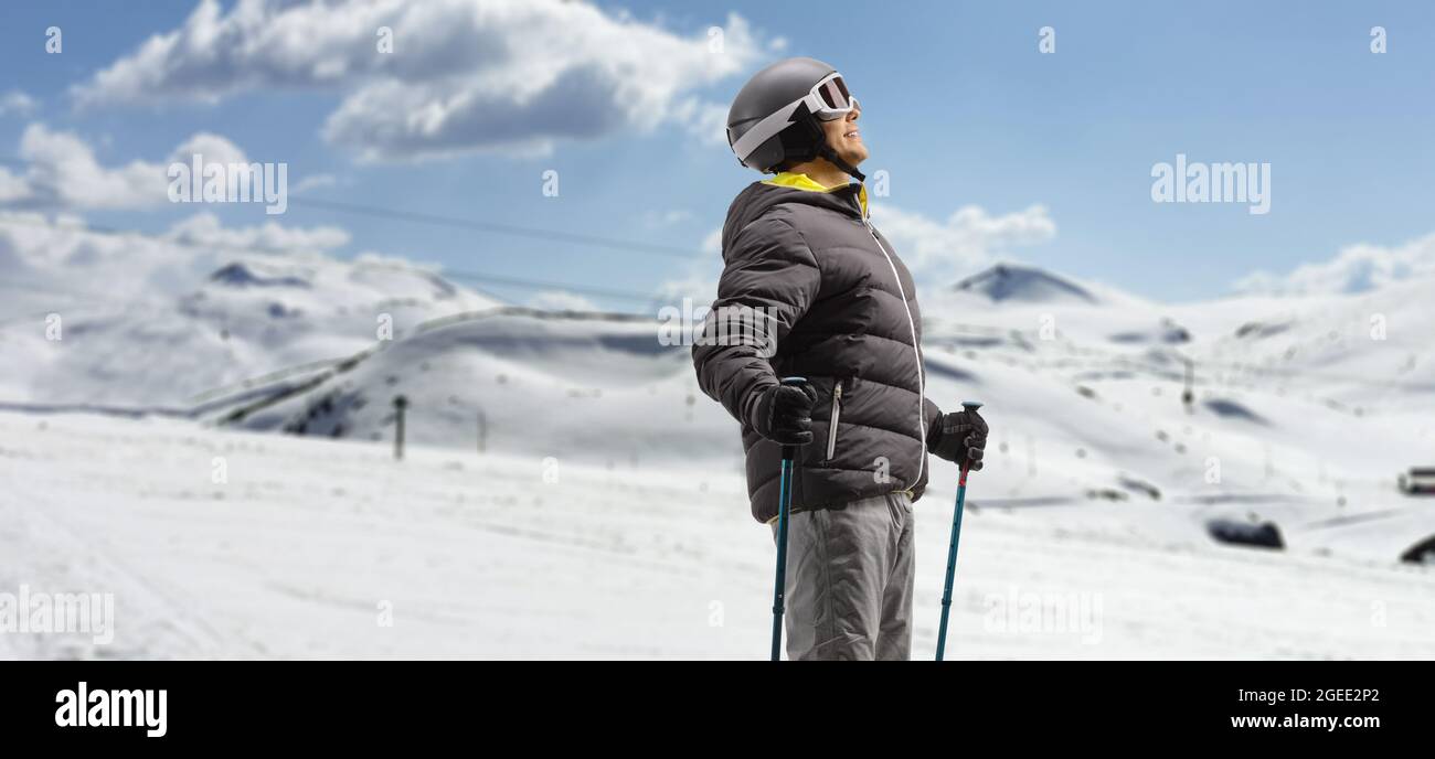 Man standing on a slope hi-res stock photography and images - Alamy