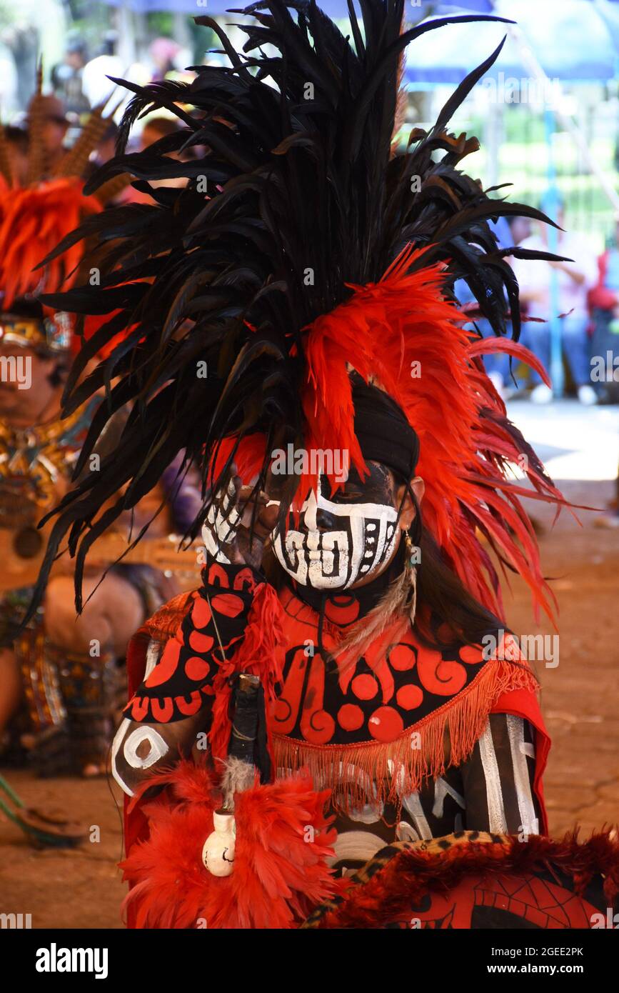 An Aztec dancer kneels during a traditional dance Stock Photo - Alamy
