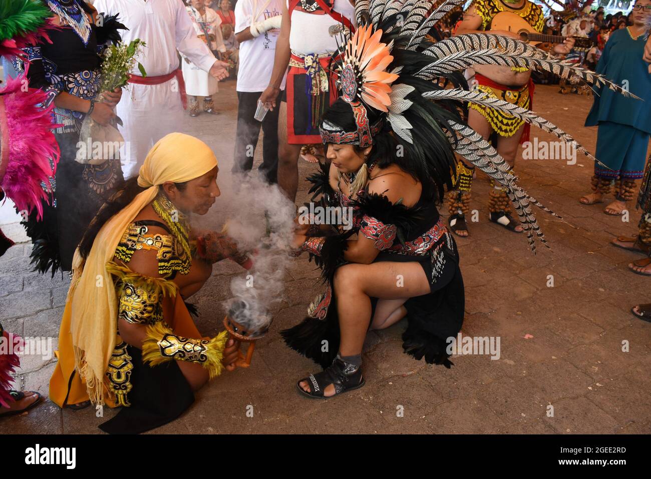 Before participating in a ceremonial dance, dancers undergo a ...
