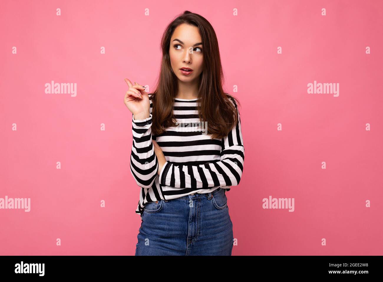 Photo shot of cute attractive pretty thoughful dreaming young brunette ...