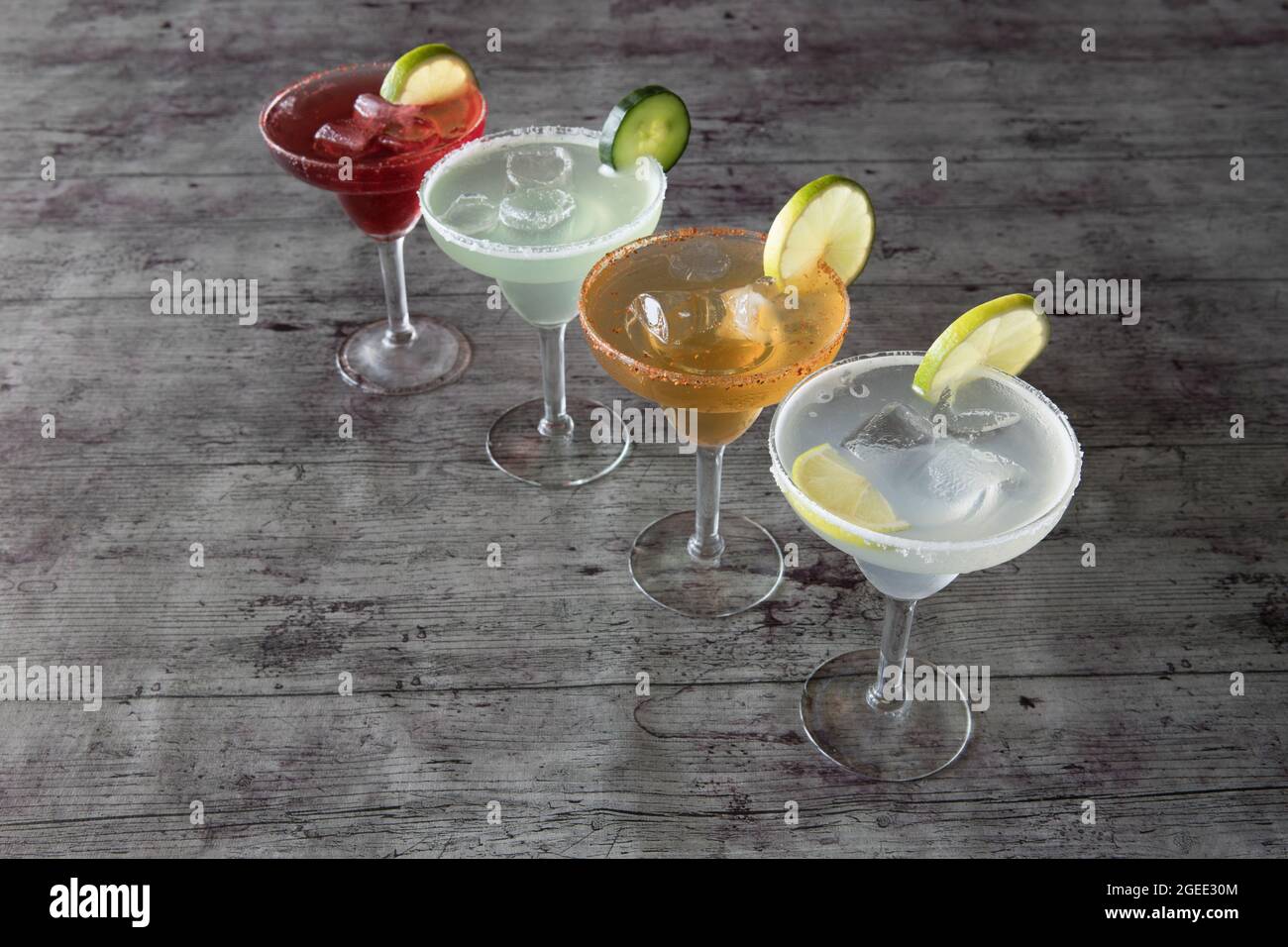 Cocktails Drinks in Cristal glasses colorful set Stock Photo - Alamy