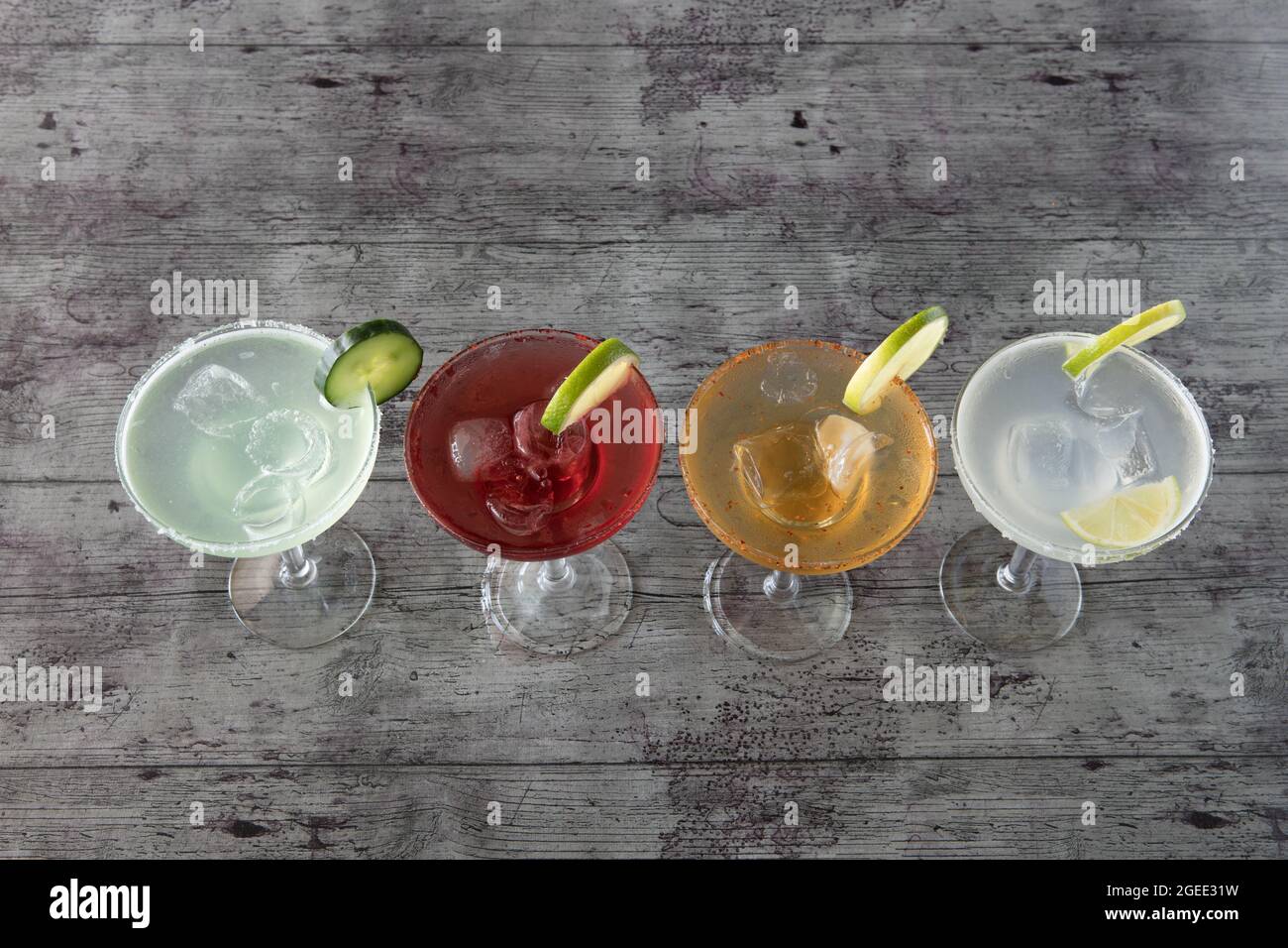 Cocktails Drinks in Cristal glasses colorful set Stock Photo - Alamy