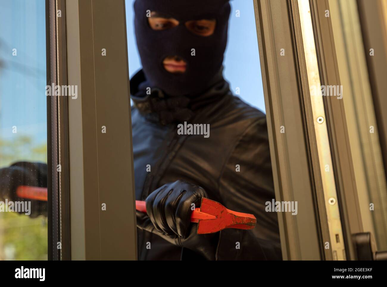 Burglar breaking in house hi-res stock photography and images - Alamy