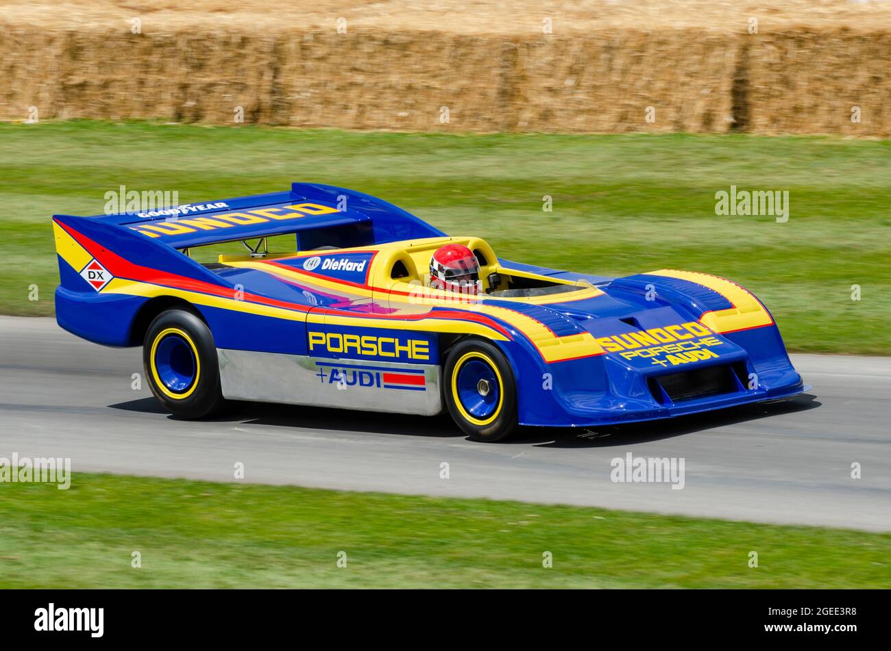 1973 Porsche 917-30 Can Am racing car driving up the hill climb track at the Goodwood Festival ...