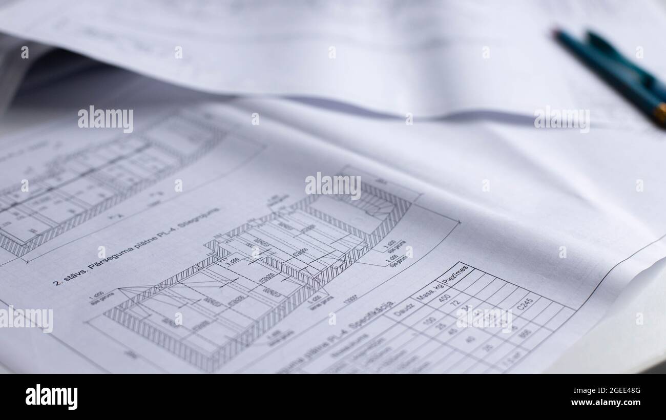 drawings of a construction engineer on a sheet of paper Stock Photo - Alamy