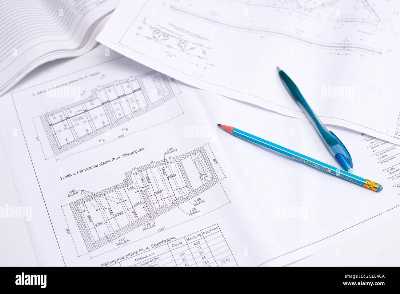 drawings of a construction engineer on a sheet of paper Stock Photo - Alamy