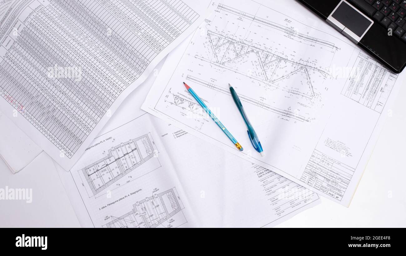 drawings of a construction engineer on a sheet of paper Stock Photo - Alamy