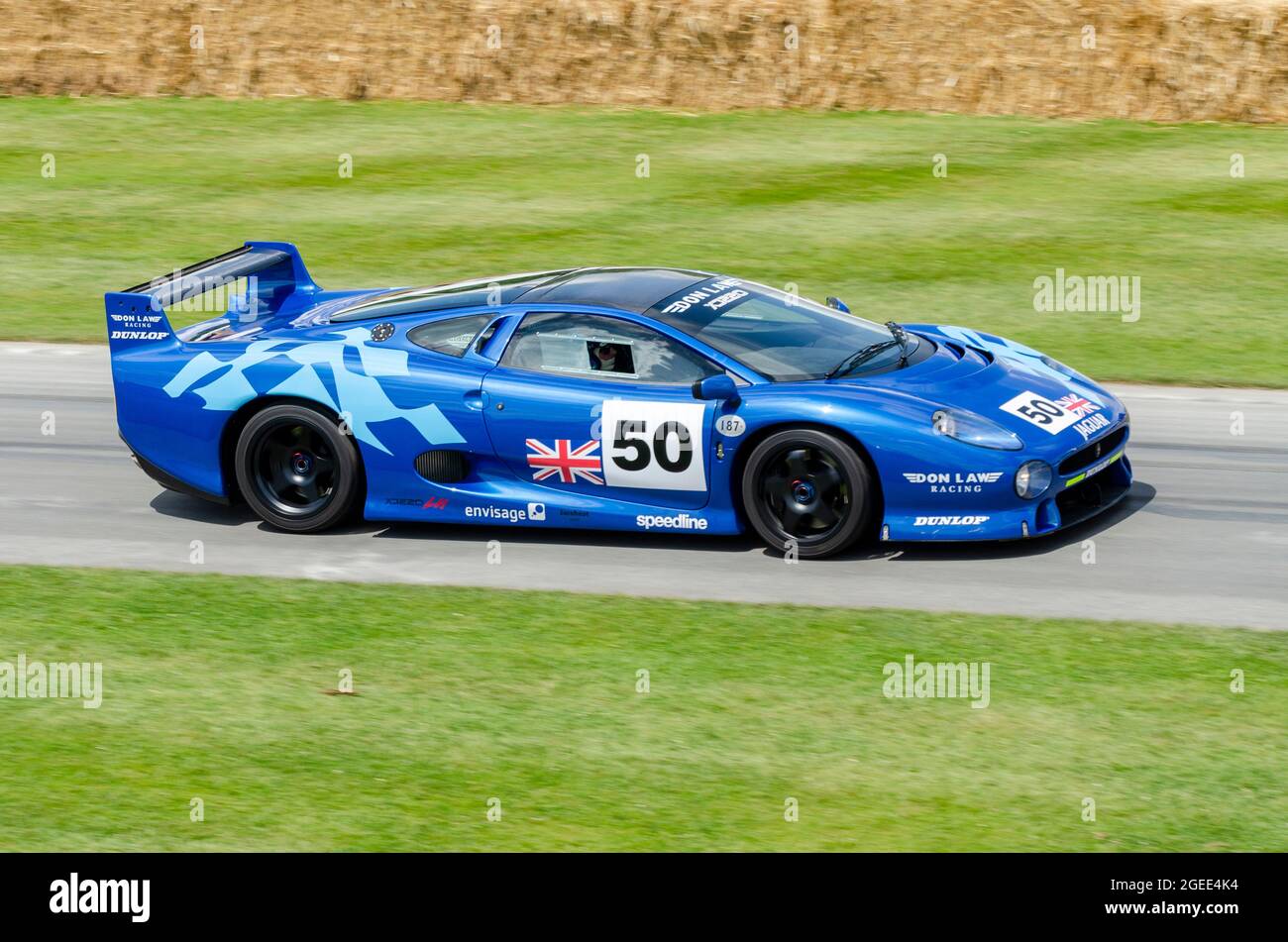 Jaguar XJ220 LM of Don Law Racing, racing car driving up the hill climb ...