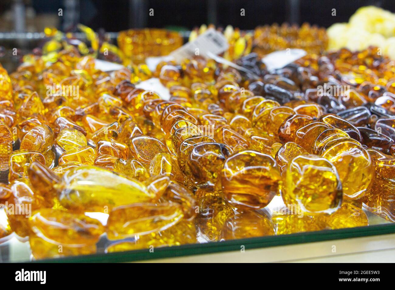 Beautiful jewelry made of natural amber. Jewelry made of amber yellow ...