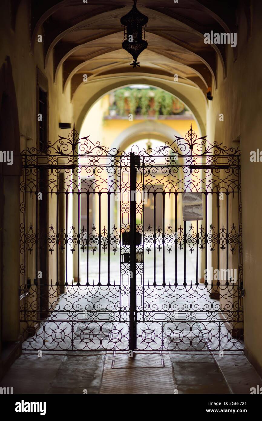 Wrought iron gate in italy hi-res stock photography and images - Alamy