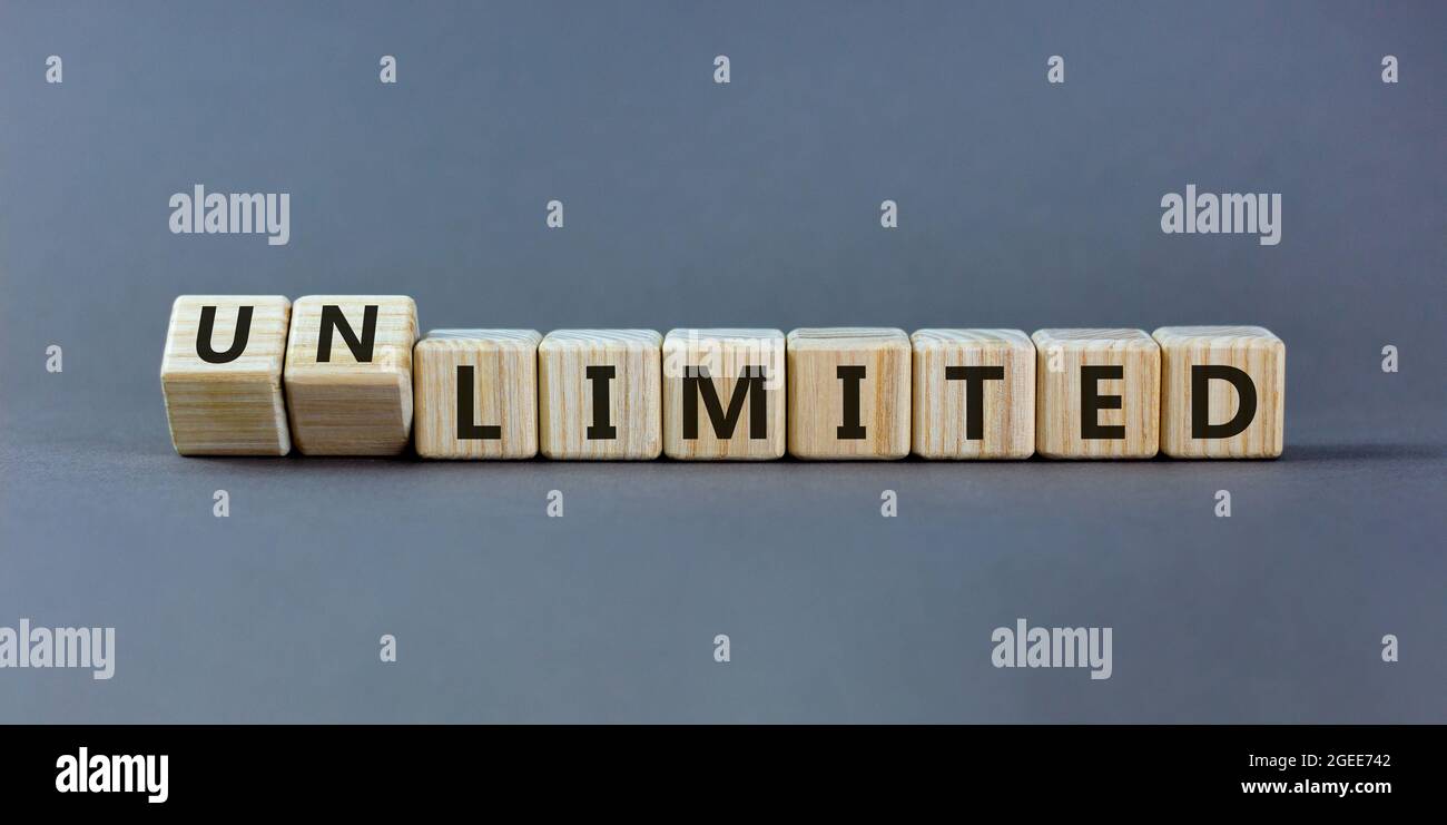 Limited or unlimited symbol. Turned wooden cubes and changed words ...