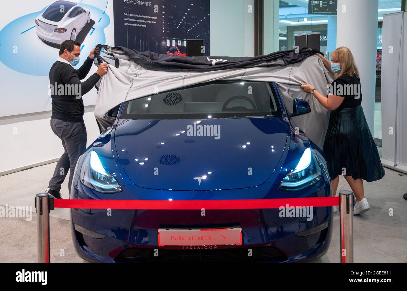 Berlin, Germany. 19th Aug, 2021. A Tesla Model Y is unveiled in a Tesla ...
