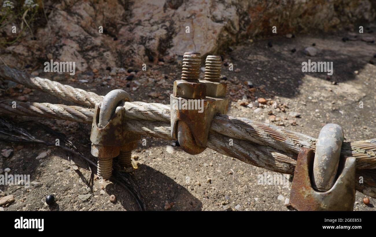 Rusty bending from a bolt and a nut outdoors Stock Photo - Alamy
