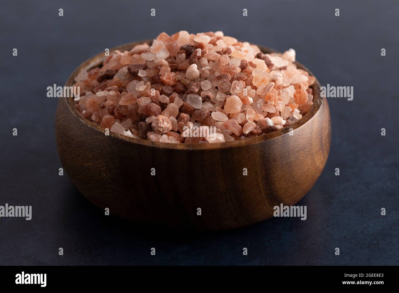 Pink Himalayan Sea Salt on a Blue Table Stock Photo - Alamy