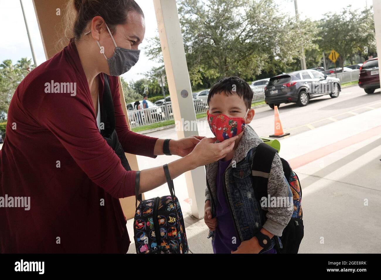 Dolphin Bay Elementary School student Gael Fernandez gets an assist ...