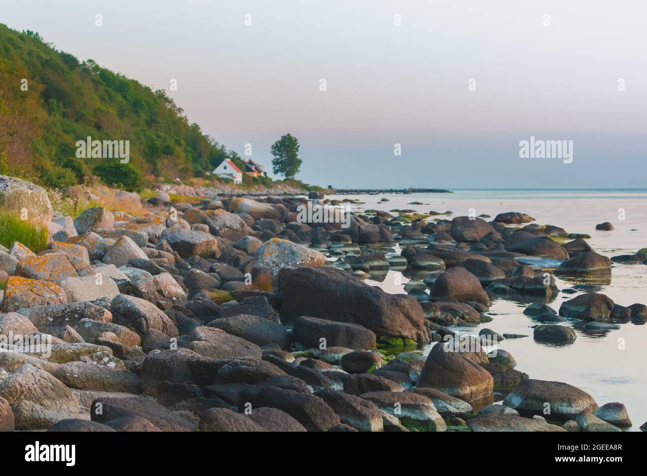 Sunset in Bornholm island in rocky beach. Summer time, Bornholm danish ...