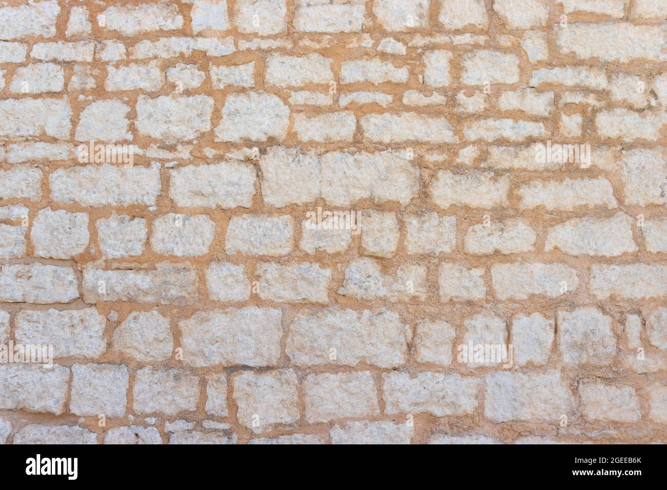 Stone wall made of stacking blocks of stone Stock Photo - Alamy