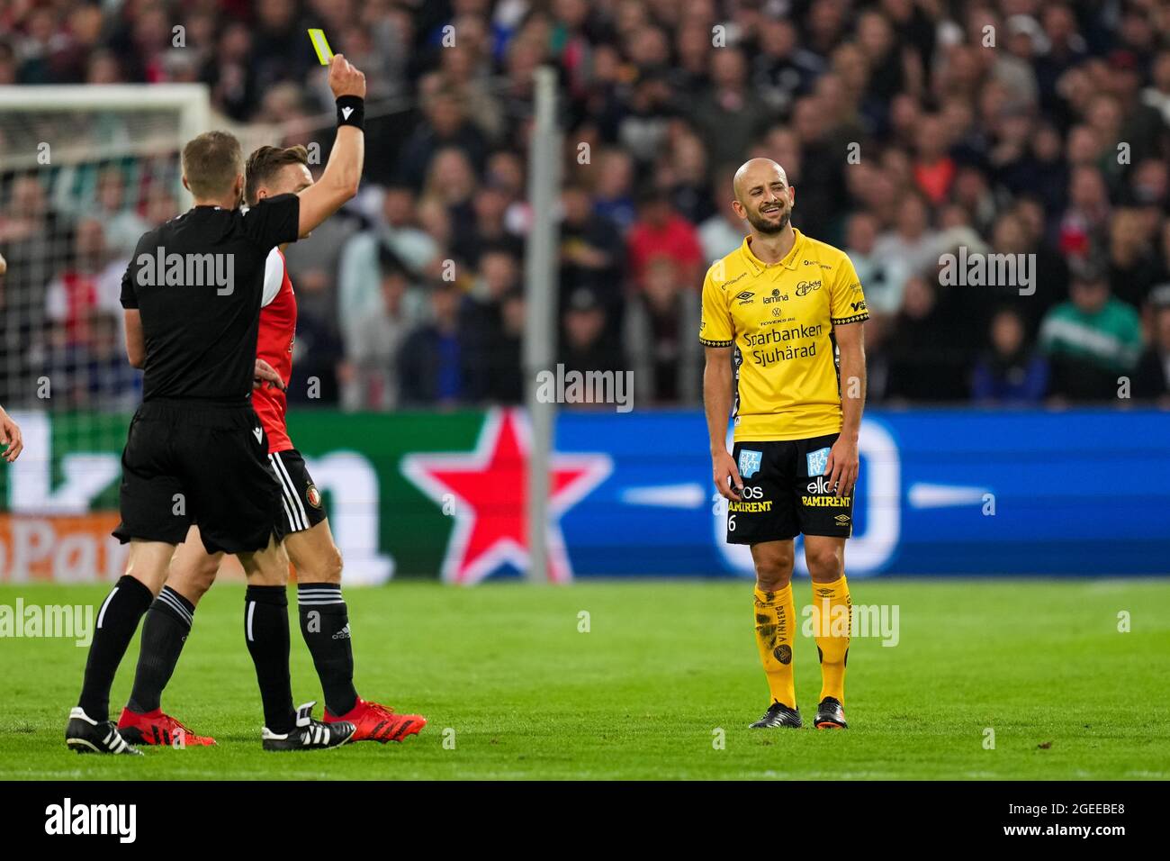 ROTTERDAM, NETHERLANDS - AUGUST 19: referee Craig Leigh Pawson gives yellow card during the UEFA ...