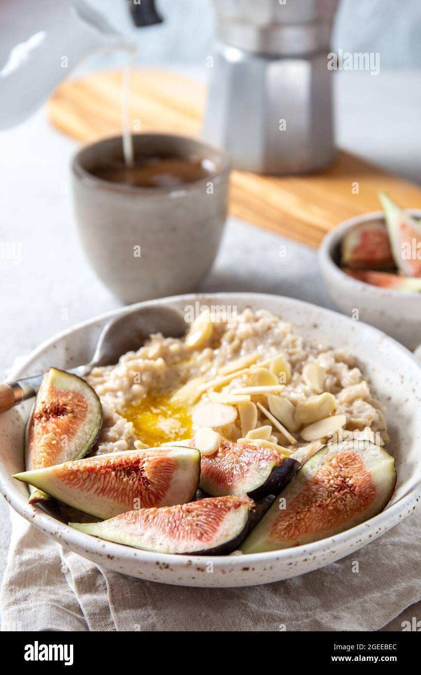 Healthy Oatmeal with figs. Coffee, oatmeal breakfast concept Stock ...
