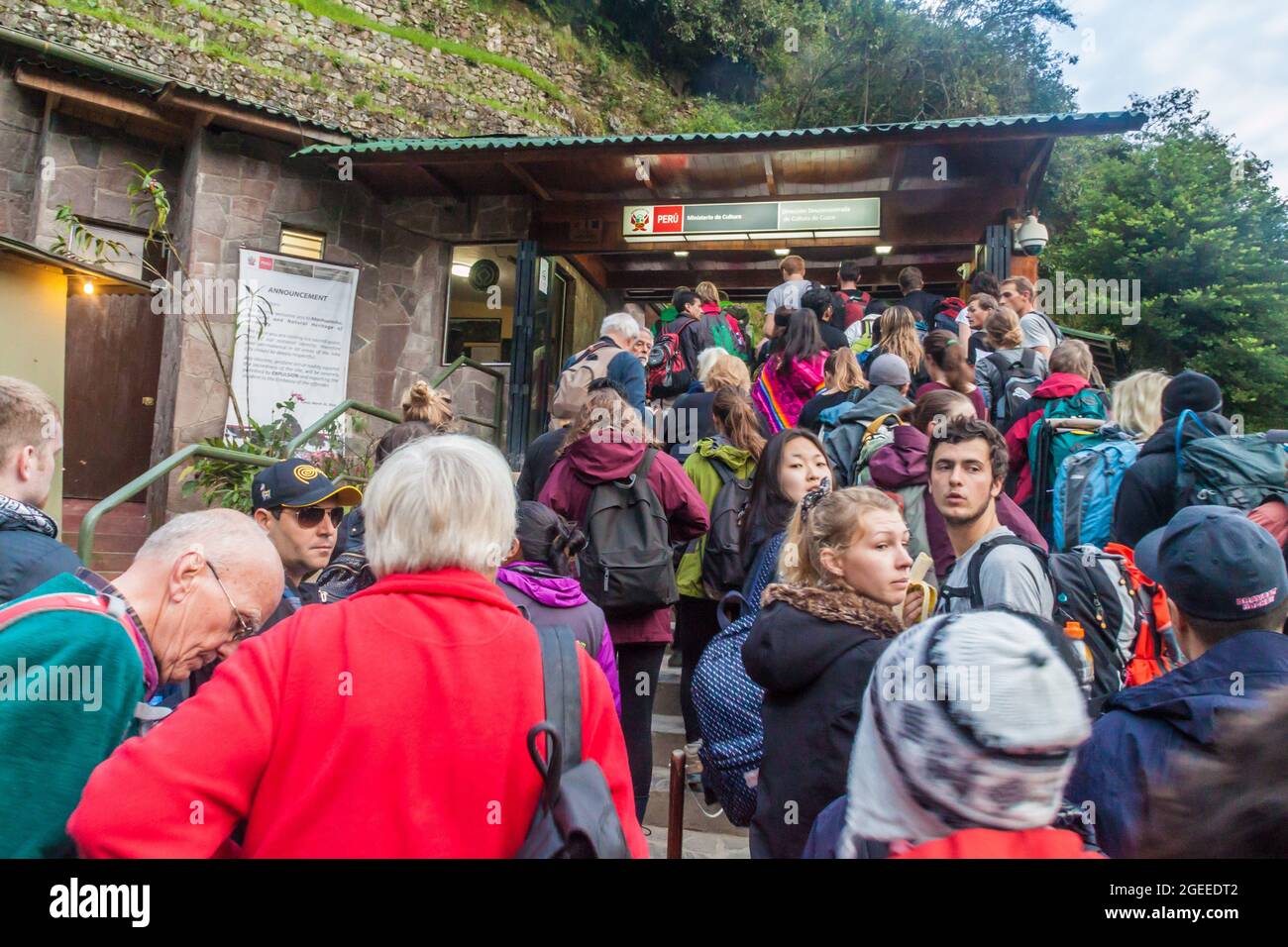 MACHU PICCHU, PERU - MAY 18, 2015: Visitors are waiting at the entrance ...