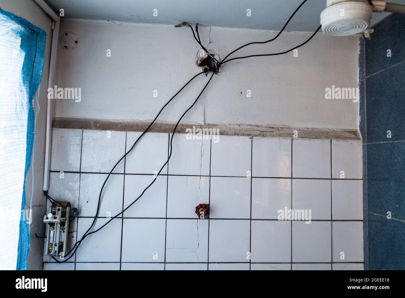 Dangerous electric installation in a shower in Bolivia Stock Photo - Alamy