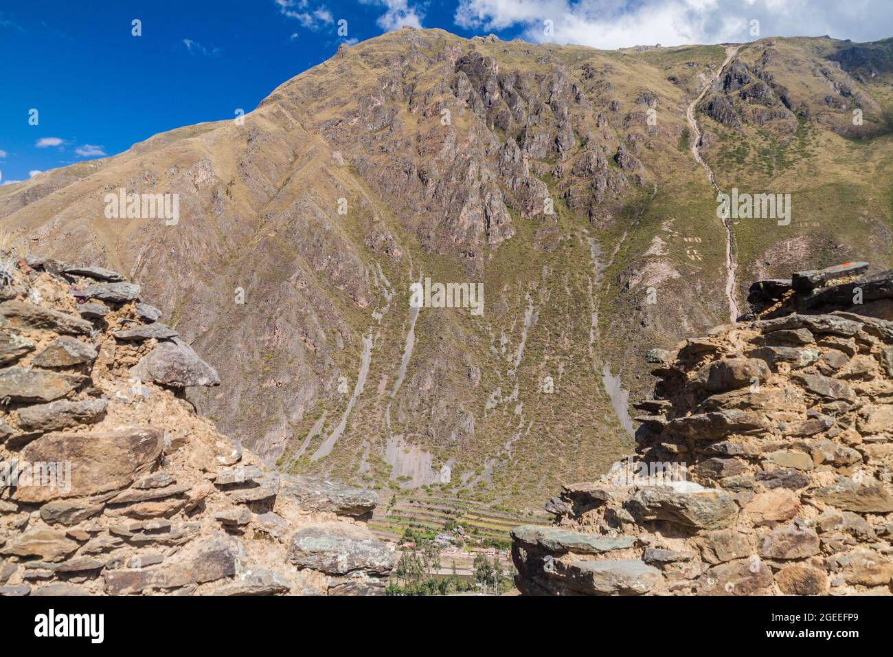 View of Sacred Valley of Incas behind ruined wall, Peru Stock Photo - Alamy