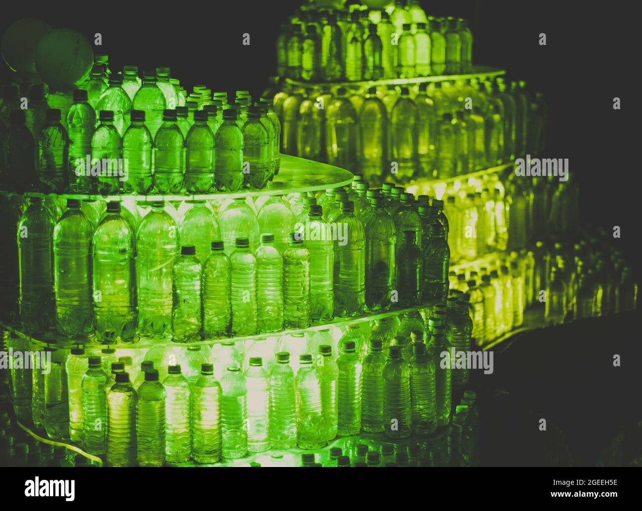 View of green plastic bottles Stock Photo - Alamy
