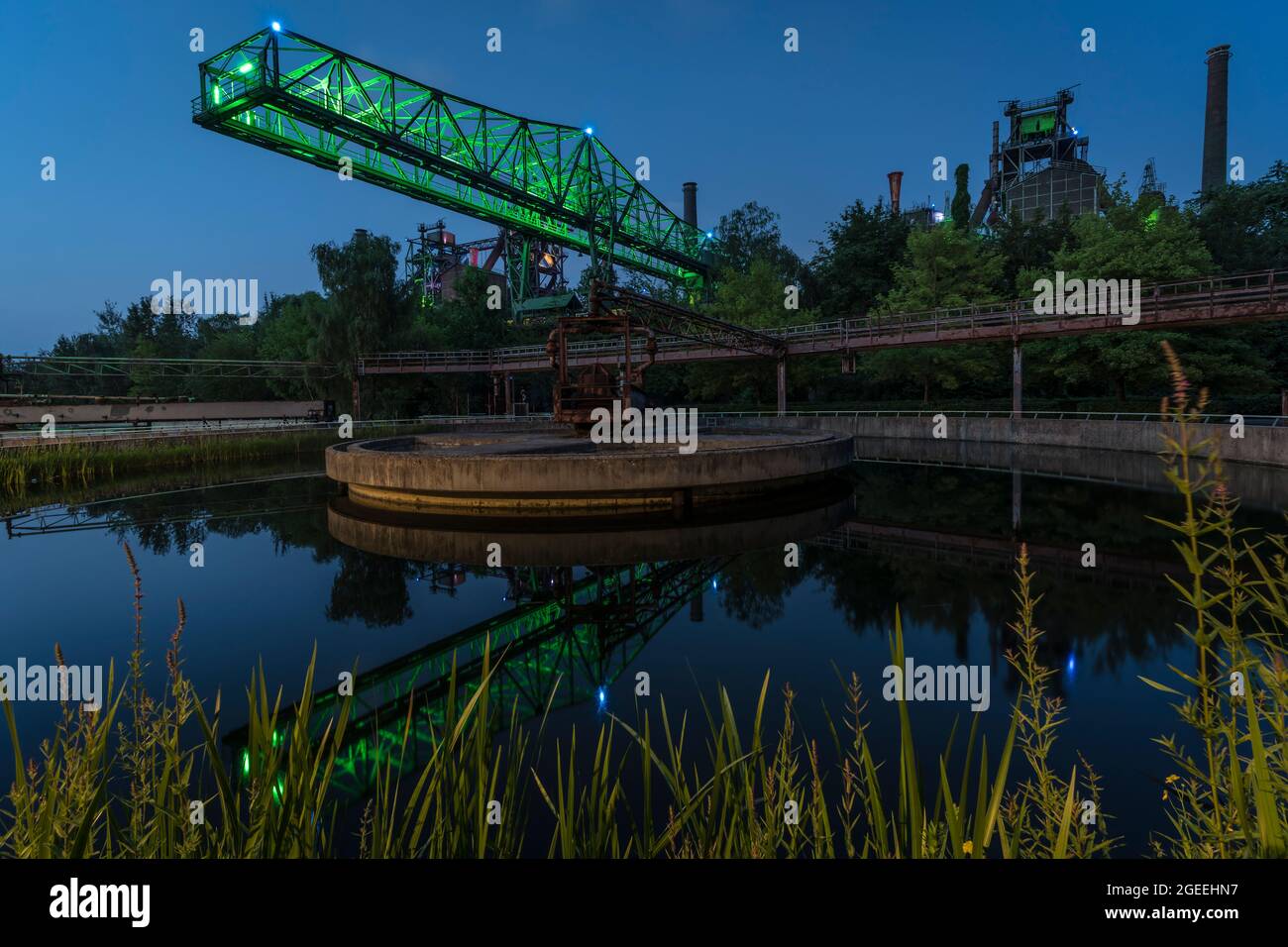 illuminated historic steelwork buildings at night Stock Photo - Alamy