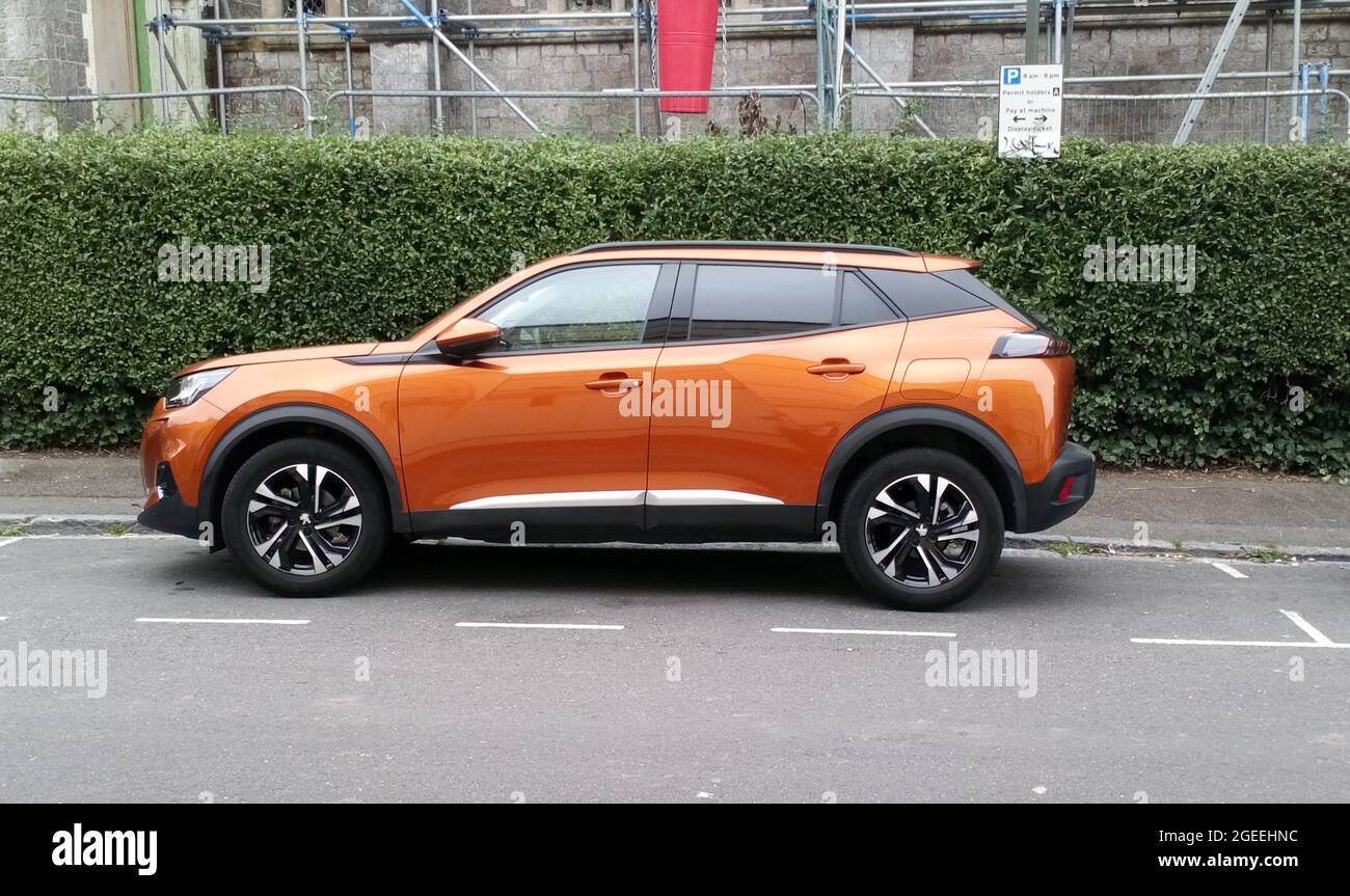 A 2020 orange Peugeot 2008 parked in Torquay, Devon, England, UK Stock ...