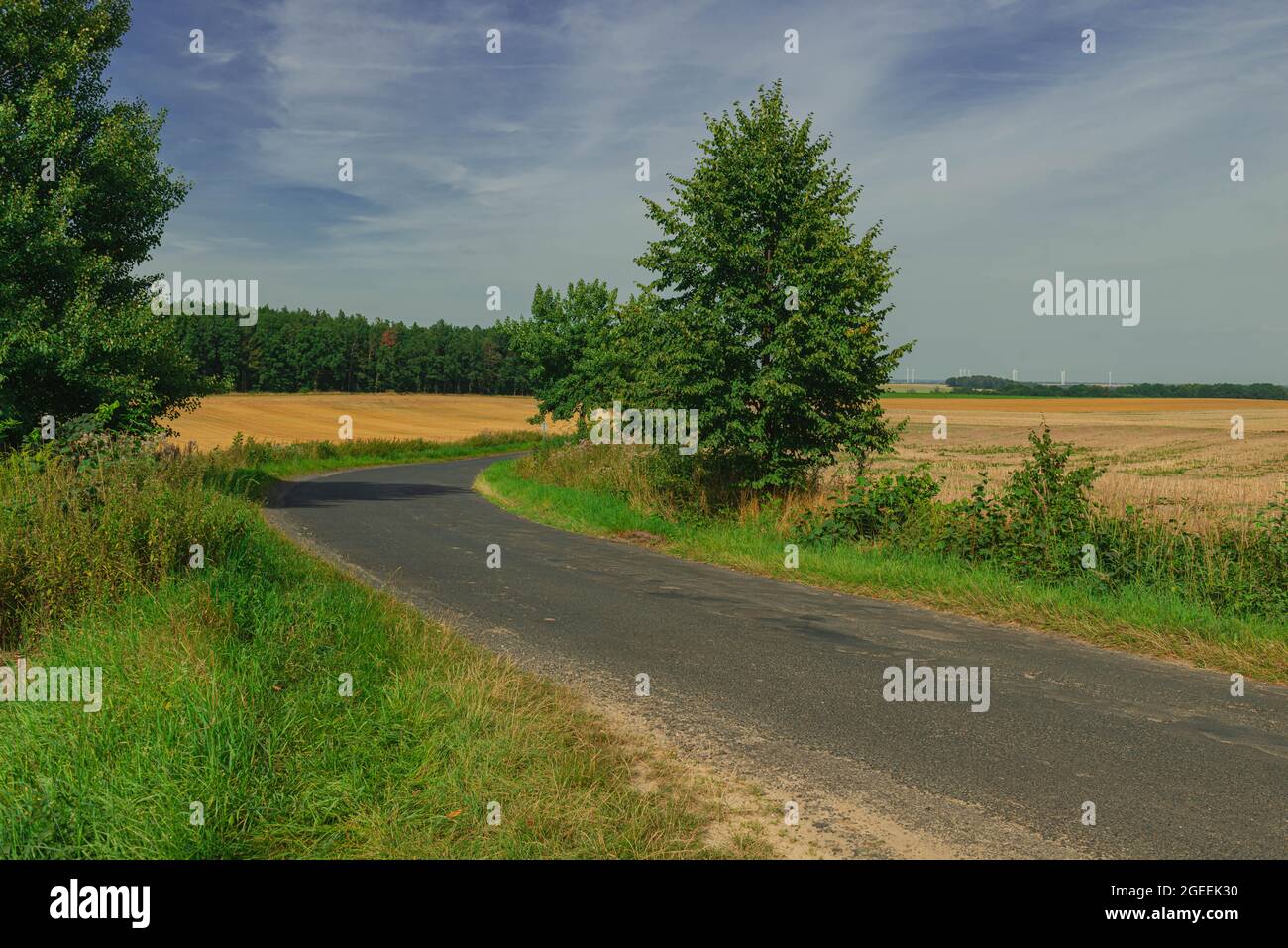 Undulating, uneven terrain covered with meadows and arable fields ...