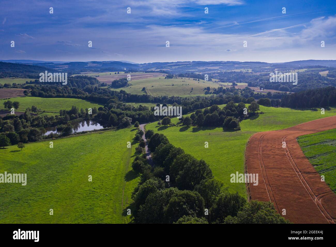 Sudeten foothills. Undulating terrain covered with arable fields ...