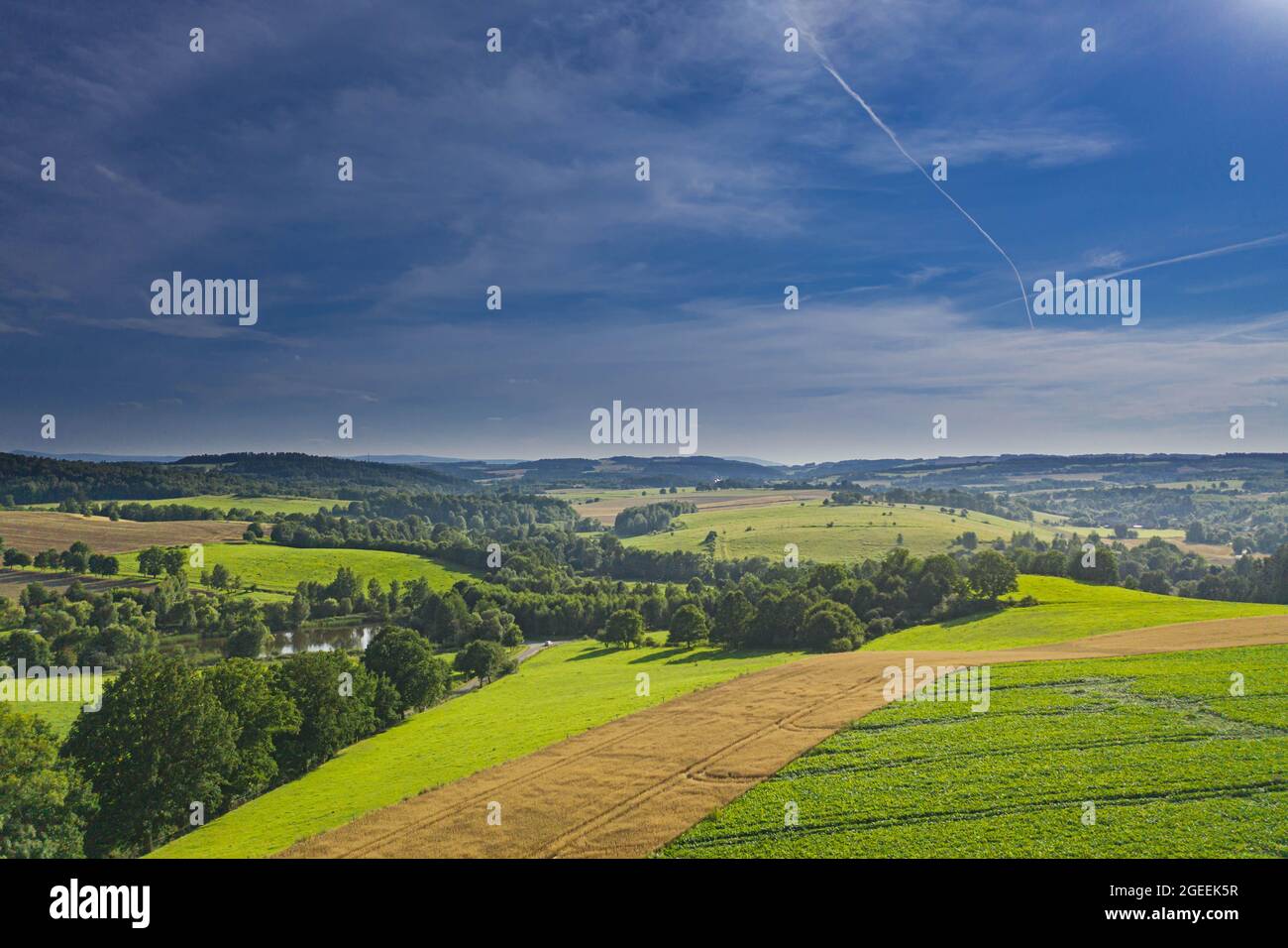 Sudeten foothills. Undulating terrain covered with arable fields ...